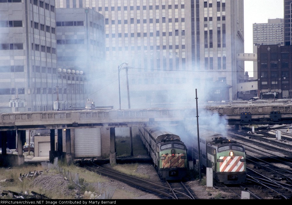 BN 9918 Afternoon Outbound and 9900 Backing Into Station